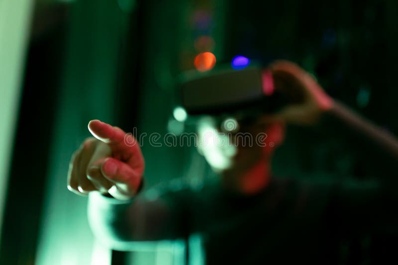 Asian Man Wearing Vr Headset Touching an Invisible Screen in Computer ...