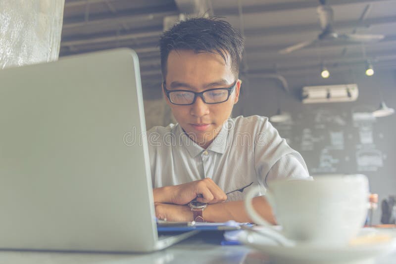 Asian Man in White Shirt Reading Document Report Stock Photo - Image of ...