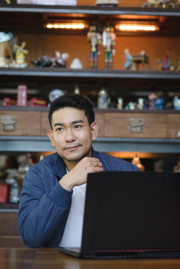 Asian Man Working with Laptop in Cafe Stock Photo - Image of drink ...