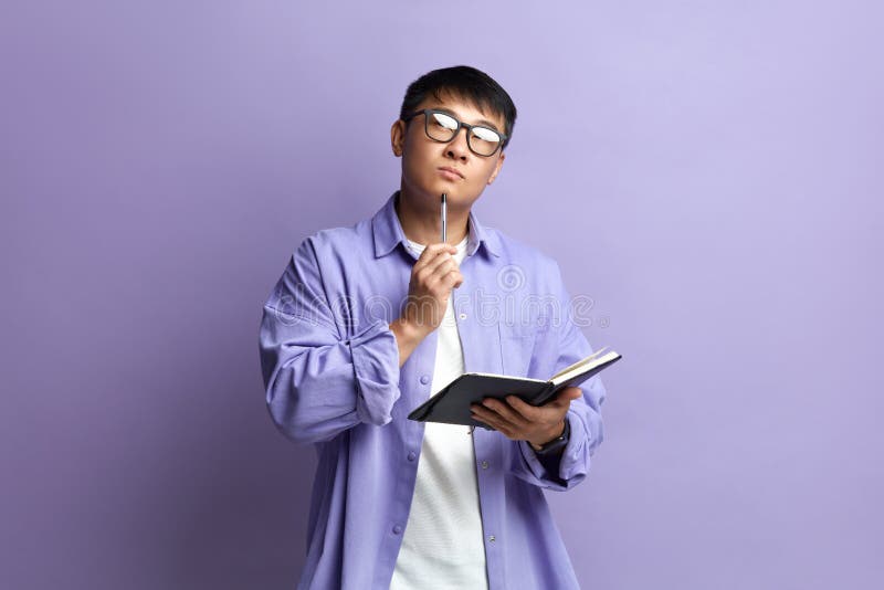 Asian Man Writing Notebook. Portrait of Guy Making Notes in Paper ...