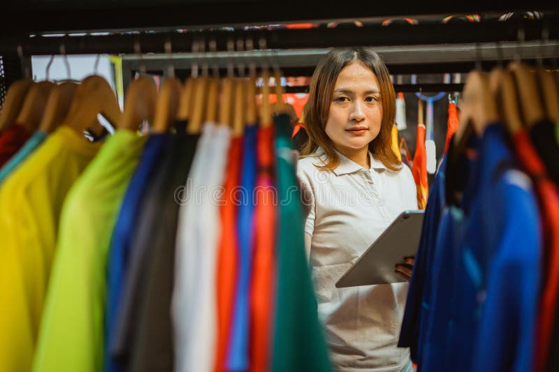 Asian Manager Checking Hanging Sportswear Clothing Stock Image - Image ...