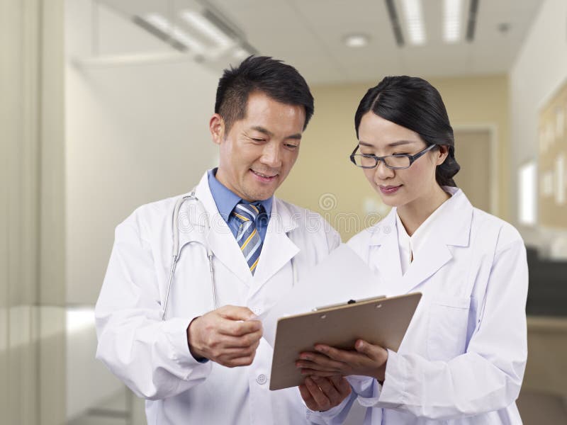 Asian Medical Professionals Stock Photo - Image of checking, chinese ...