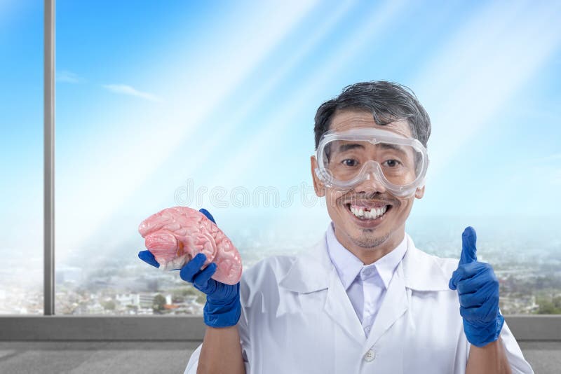 Asian Nerd Scientist Standing and Showing Thumb Up while Holding a ...