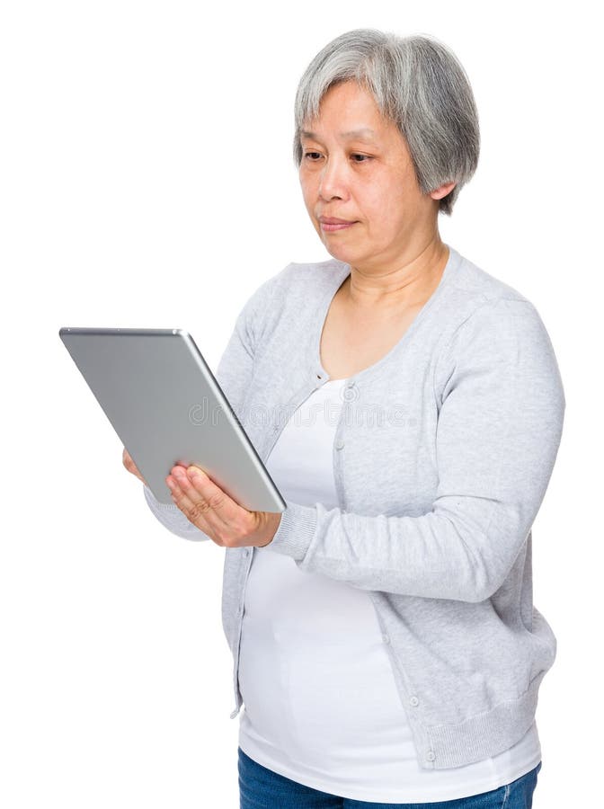 Senior Woman Enjoying Her Electronic Book Stock Image - Image of ...