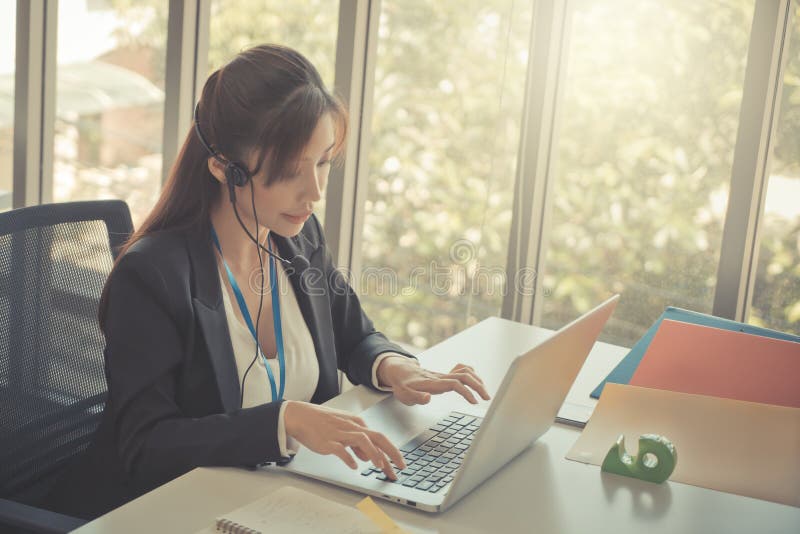 Operator, Customer Service Assistance is Answering Call from Client ...