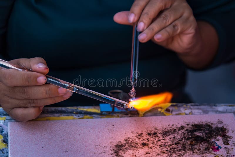 Asian People Made Hand Craft Grass Blowing with Fire Blower Stock Image ...