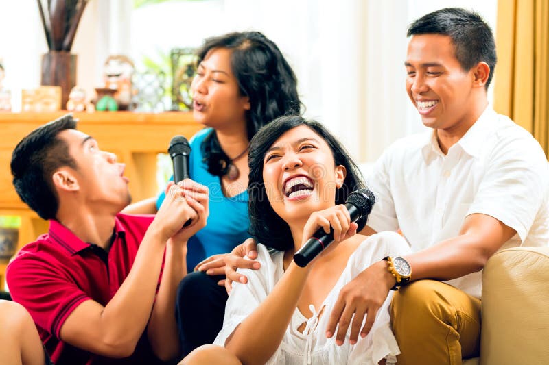 Asian People Singing at Karaoke Party Stock Image - Image of ...