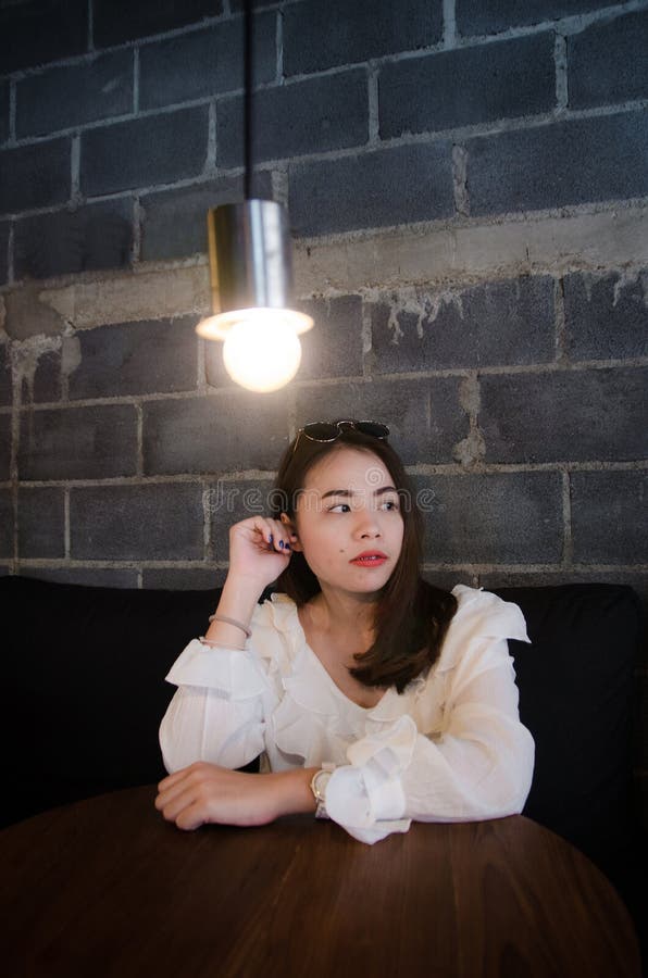 Asian Pretty Girl Sitting in Cafe Stock Image - Image of asian, happy ...
