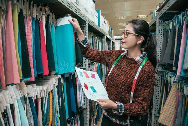 Management Choosing the Sample of Fabric Stock Image - Image of ...