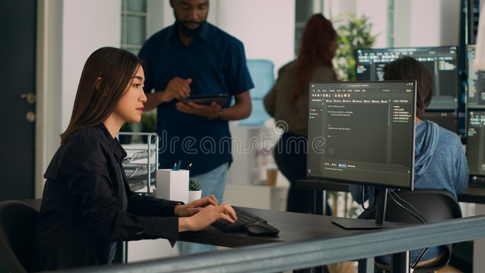 Asian Programer Typing Big Data Code on Computer To Work on App Developing Program Stock Image ...