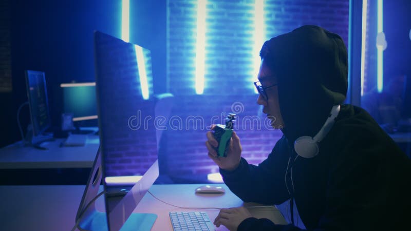 Asian Programmer Vaping Sitting at His Desktop Stock Video - Video of ...