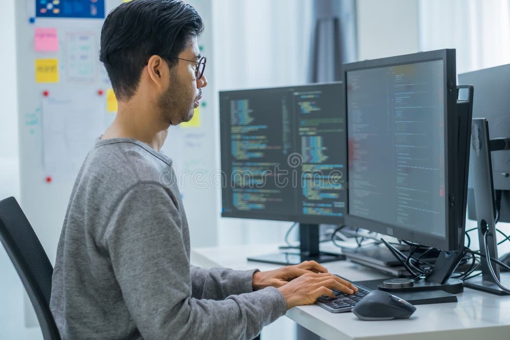 Asian Prompt Engineer Developer Coding App with Software Data Sitting ...