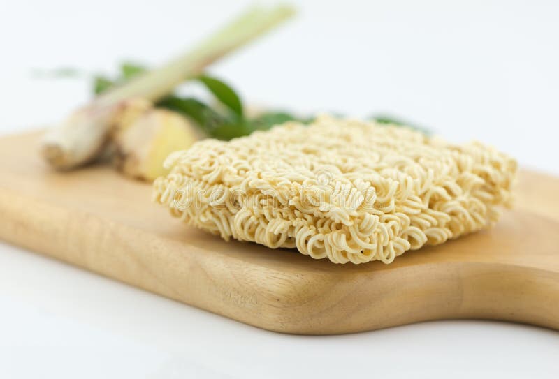 Asian Ramen Instant Noodles on Cutting Block Stock Photo - Image of ...