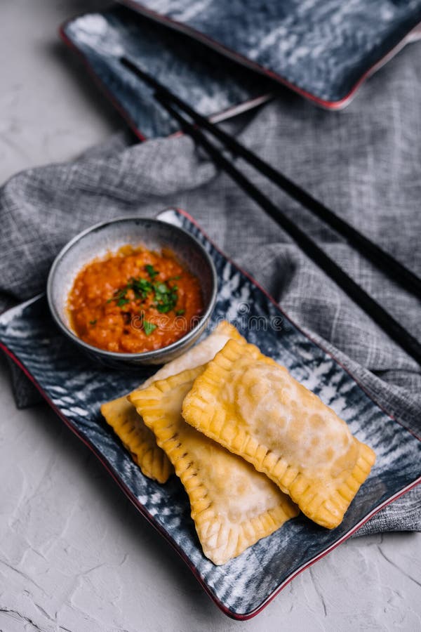 Asian Ravioli with Chopsticks Stock Photo - Image of asian, flour ...