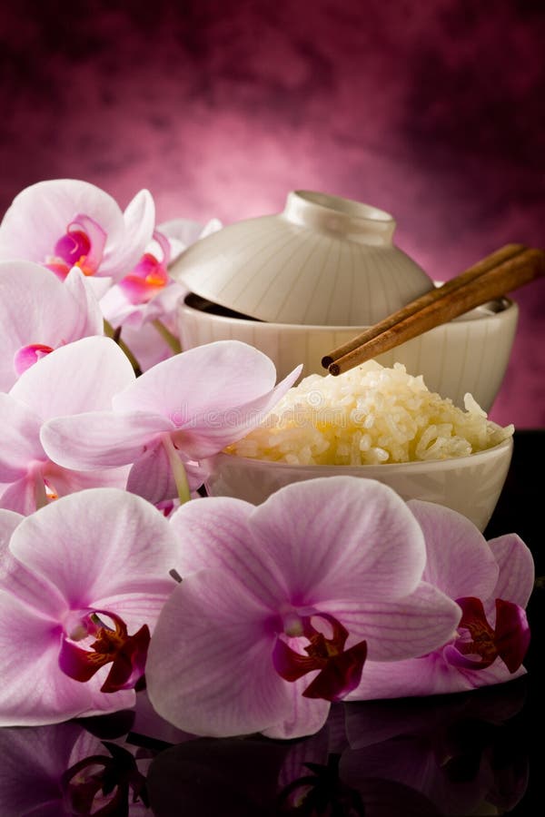 Asian Rice Dish with Orchid Flowers Stock Image - Image of grain ...