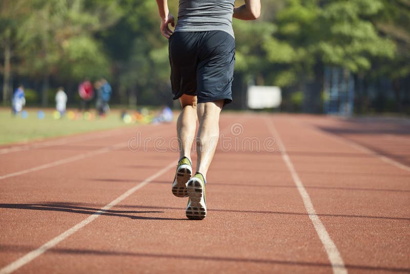 Asian Runner Running on Track Stock Image - Image of rear, china: 134084377