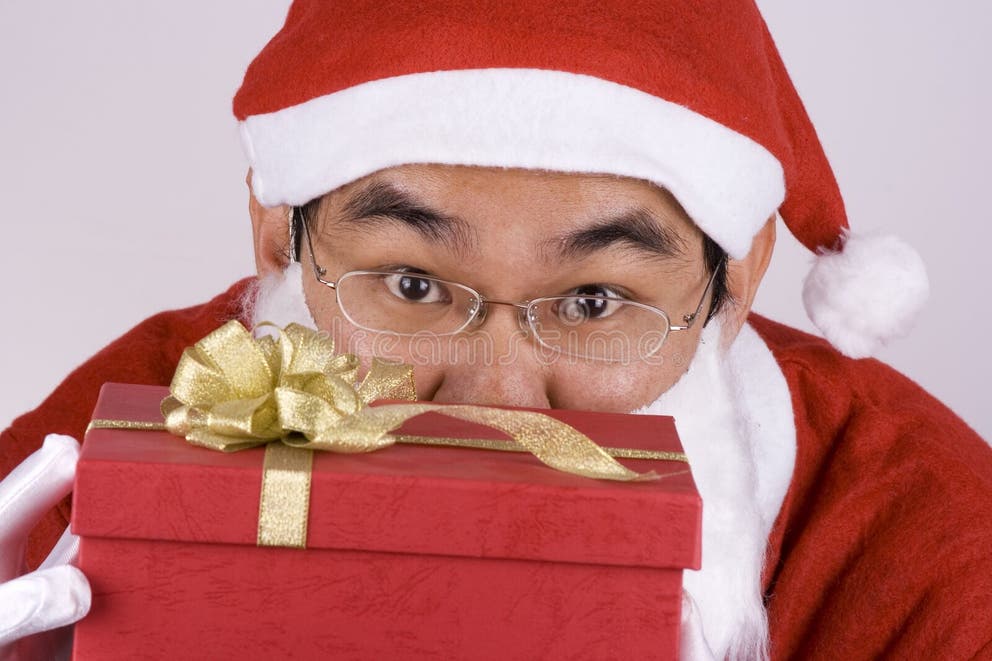 Asian Santa Claus with Present Stock Photo - Image of holding, person ...