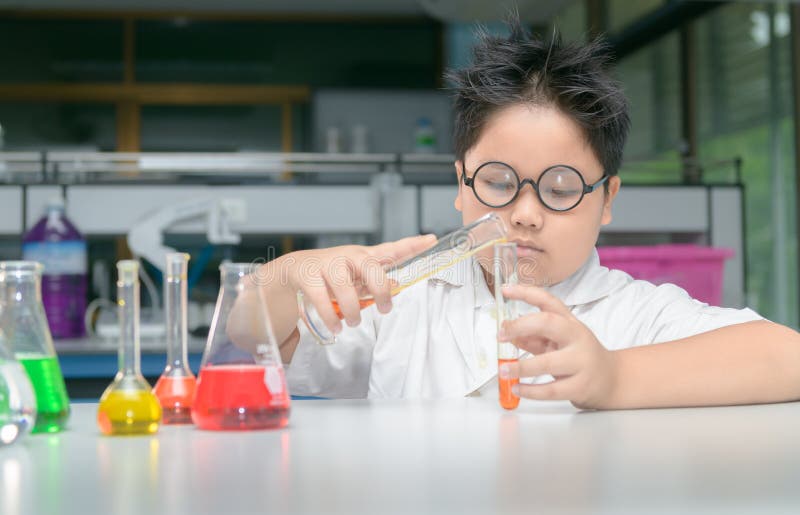 Asian School Boy is Making Science Experiments Education. Stock Photo ...