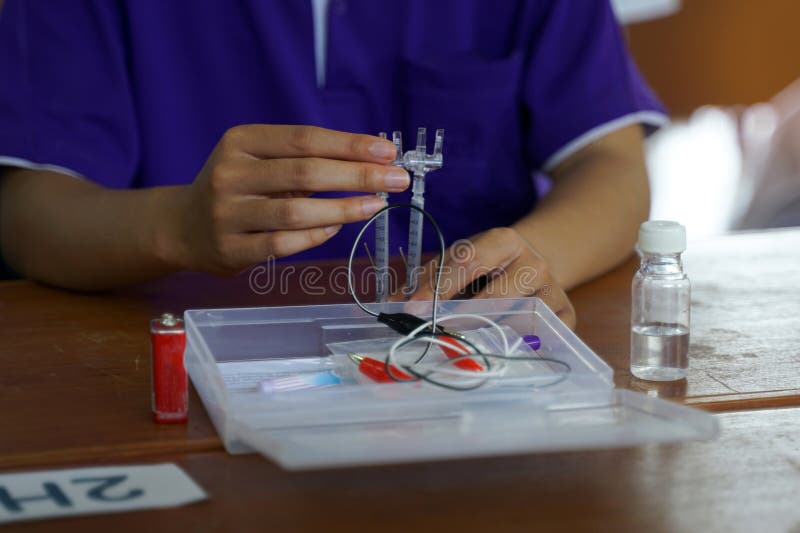 Asian School Children Conduct Science Experiments with Kits ...
