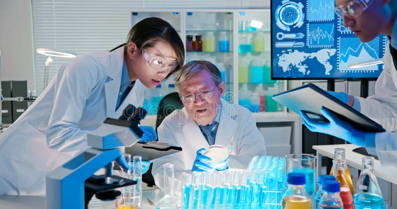 Asian Scientist Team Meeting Stock Image - Image of group, analyzing ...