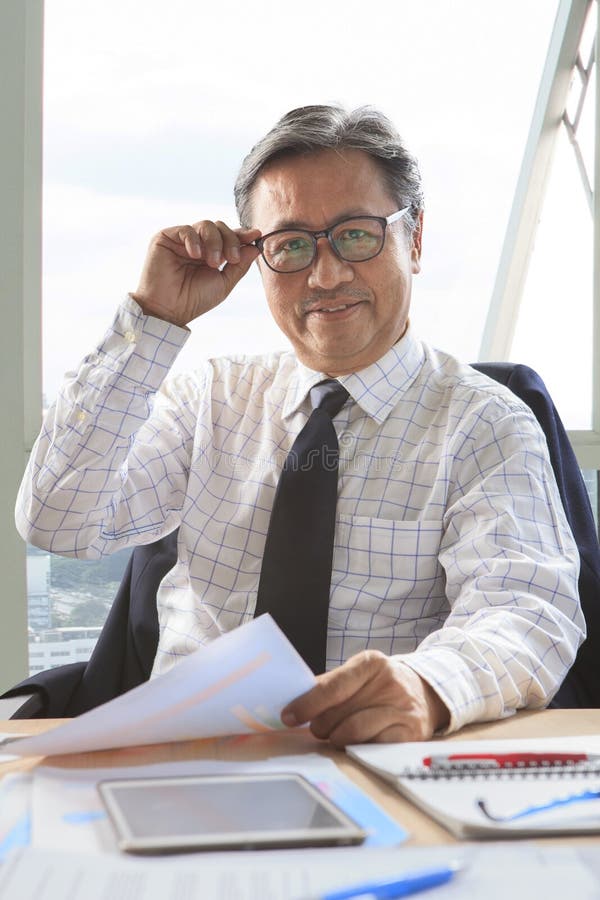 Asian Senior Business Man Relaxing on Working Table Stock Photo - Image ...