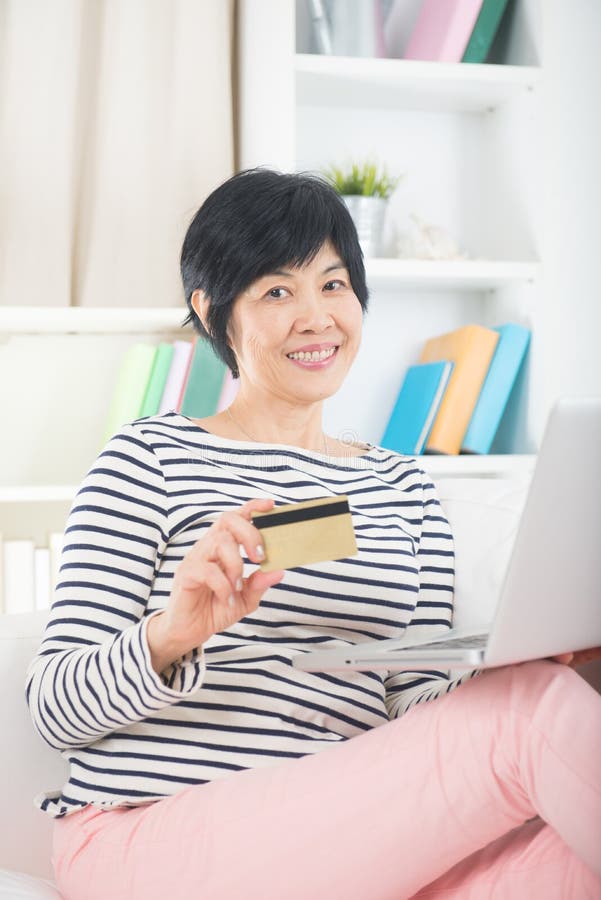 Asian Senior Female Using Credit Card Stock Photo - Image of elderly ...