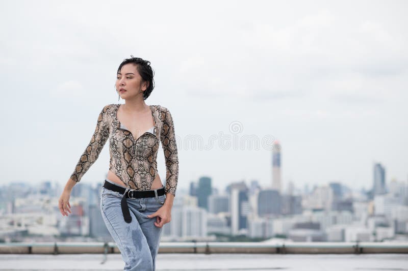 Asian Woman Dancing on Rooftop of the Building Stock Photo - Image of ...