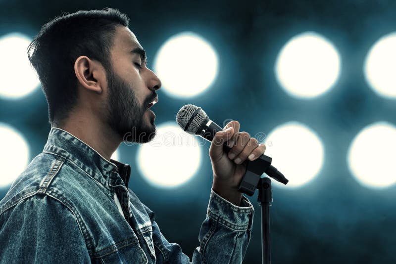 Asian Singer Singing with Microphone Stock Photo - Image of event ...