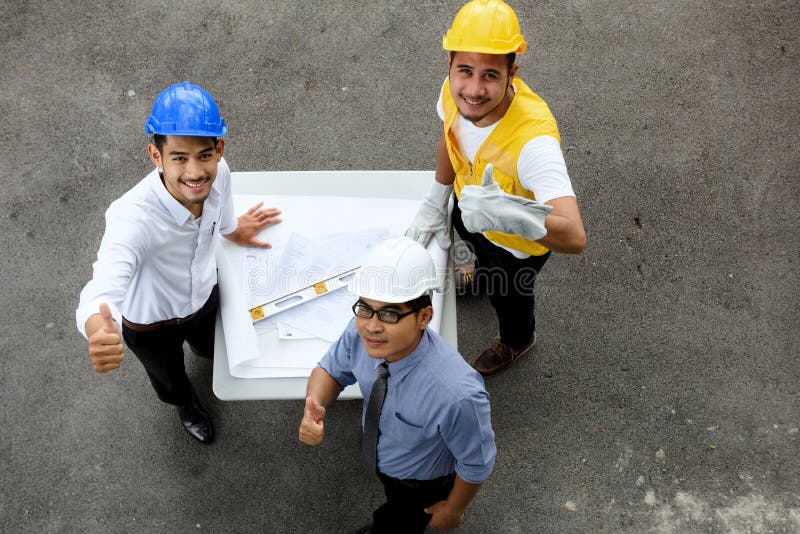 Asian Smiling Engineer Team Thumbs Up Gesture Stock Photo - Image of ...