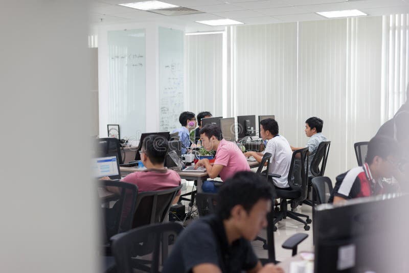 Asian Software Developers Office Team Sitting at Desk Stock Photo ...
