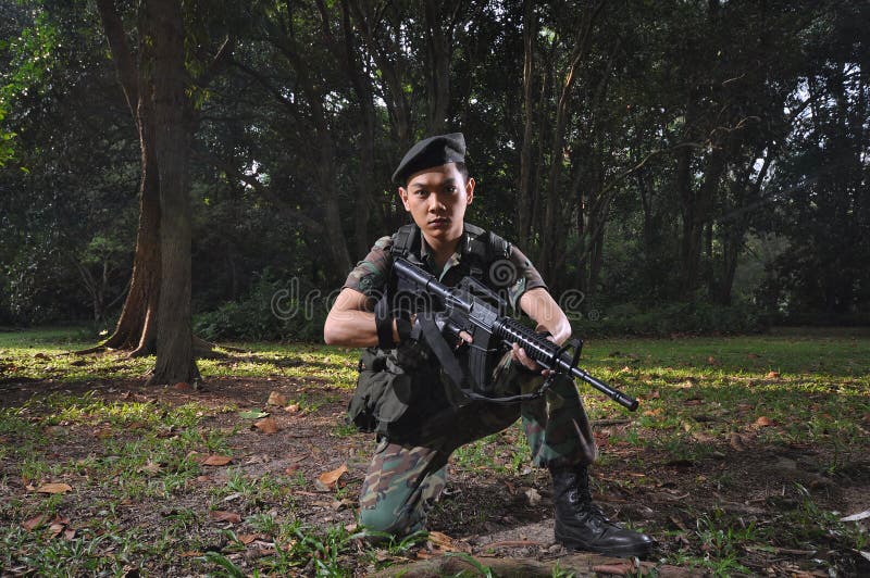 Asian Soldier Waiting for Orders To Proceed Stock Image - Image of ...