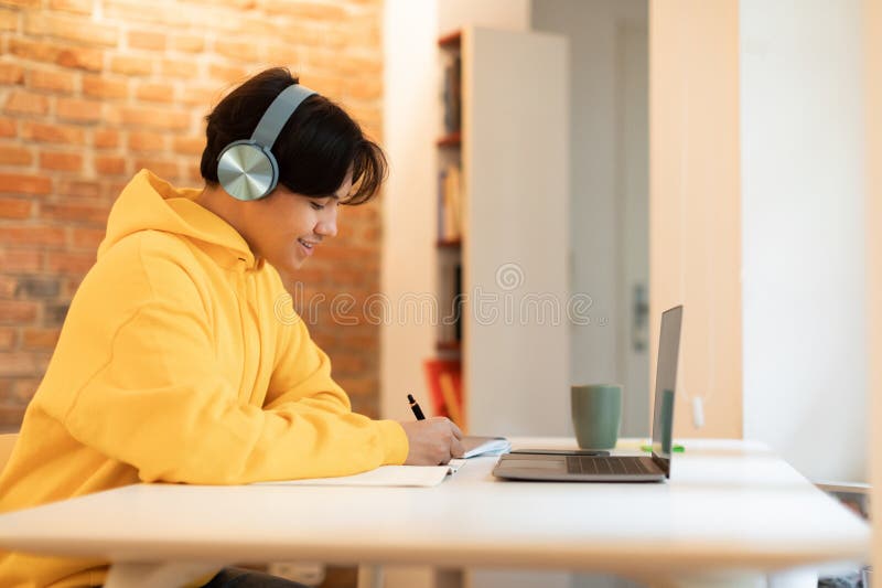 Asian Student Guy Using Laptop Writing at Home, Side View Stock Image ...