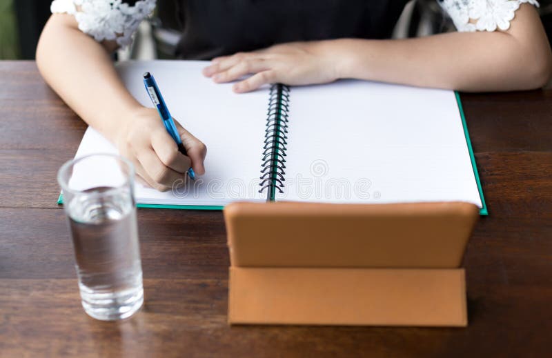 Asian Student Hand with Pen Writing on Notebook Stock Photo - Image of ...