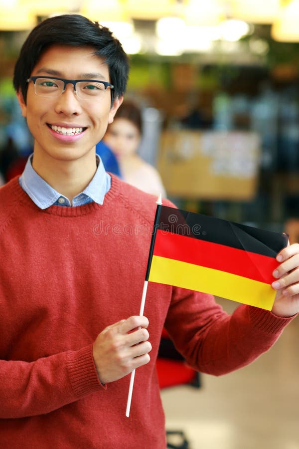 Asian Student Holding Flag of Germany Stock Photo - Image of holding ...