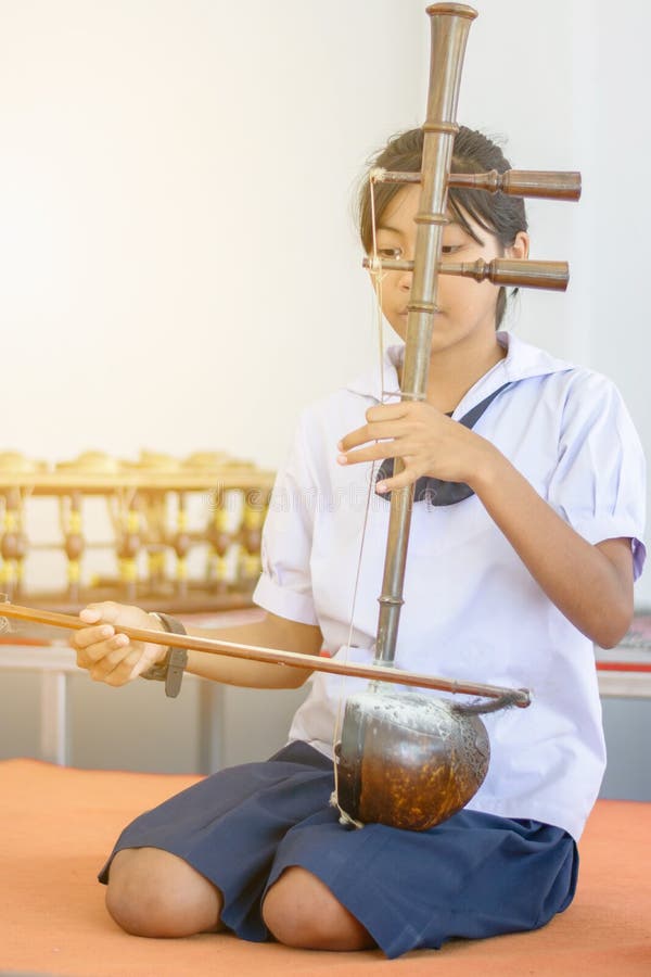 Asian Student Practicing Thai Instruments Stock Photo - Image of teach ...