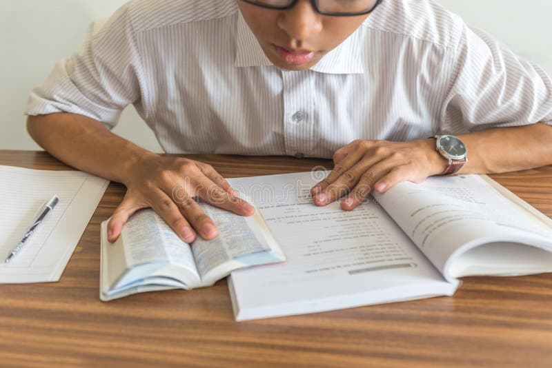 Asian Student Reading Books Stock Image - Image of exercise, notes ...