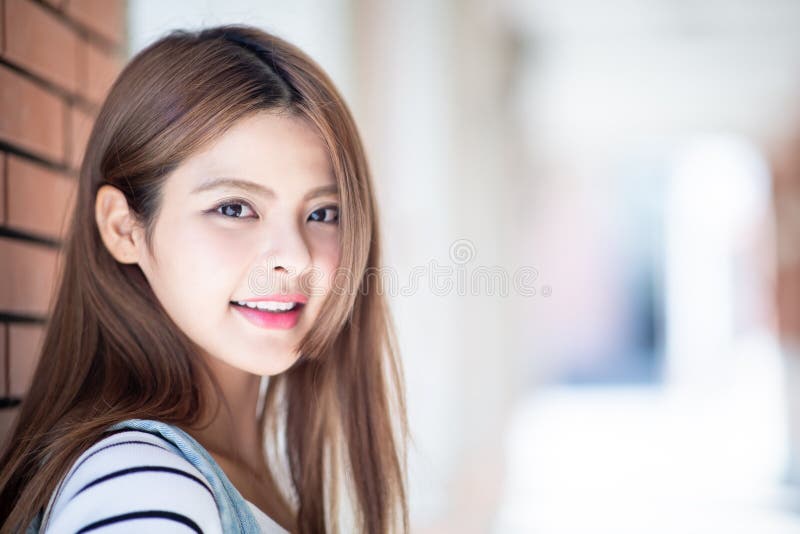 Asian student smile to you stock photo. Image of girl - 151660328