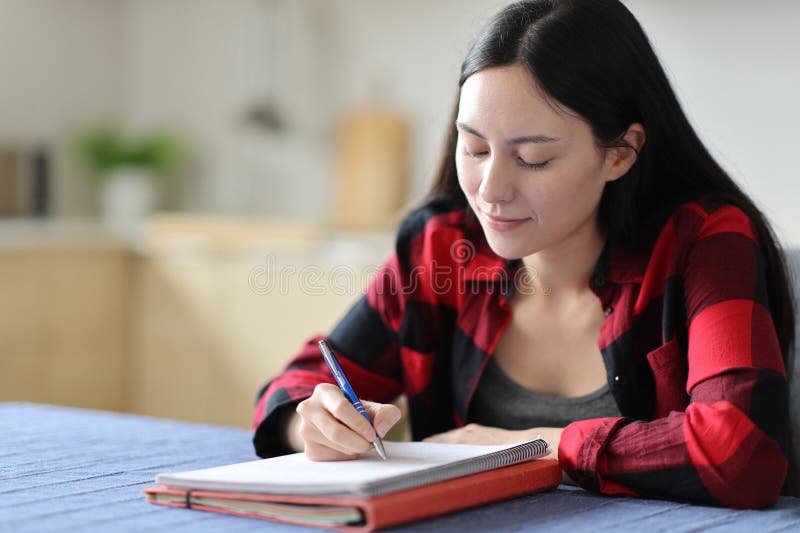 Asian Student Taking Notes Studying at Home Stock Image - Image of ...