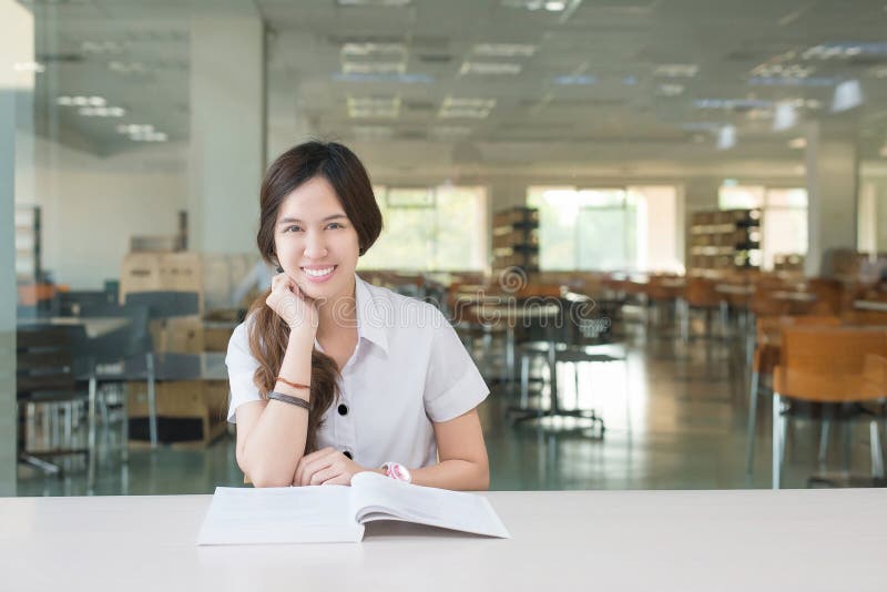 Asian Student in Uniform Reading Book at Classroom Stock Photo - Image ...