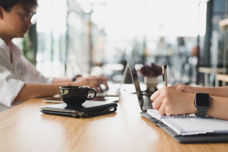 Student Using Computer for Learning Leasson Online at Cafe. Star Stock ...