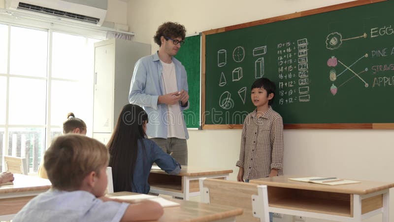 Asian Student Walk in Front of Class and Start To Introduce Himself ...
