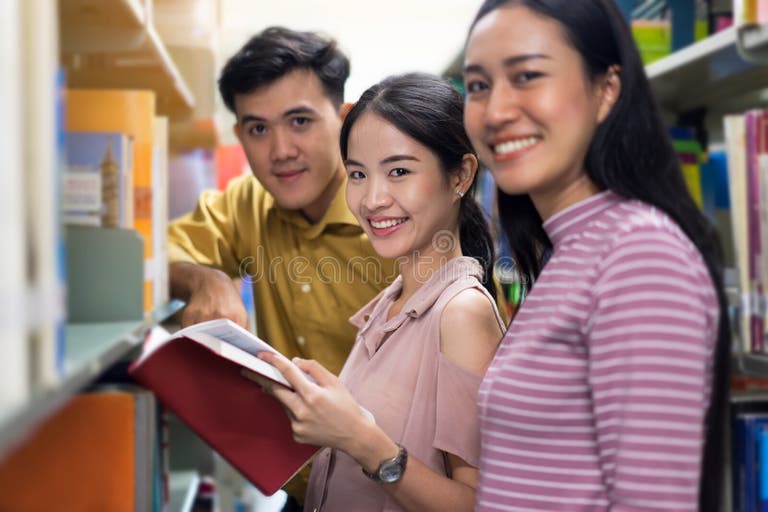 Asian Students Group Reading Book in Library, Learning and Education Concept. Stock Image ...
