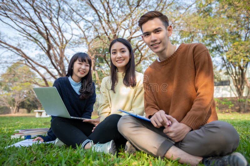 Asian Students Use Notebook Computers and Tablet To Work and Study ...