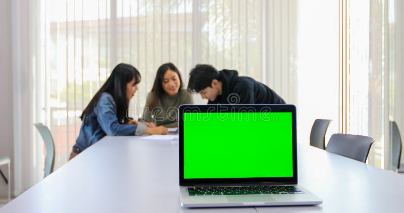Asian Students Use Notebook and Tablet Computers on Green Screen To ...