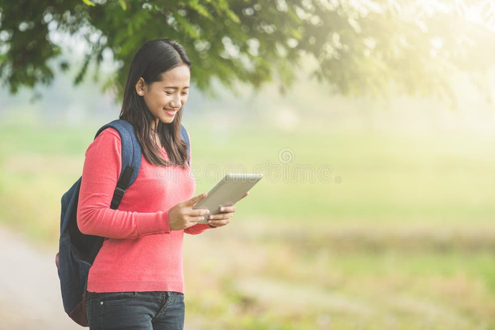 Asian Students Using Tablet Outdoor Stock Image - Image of model ...