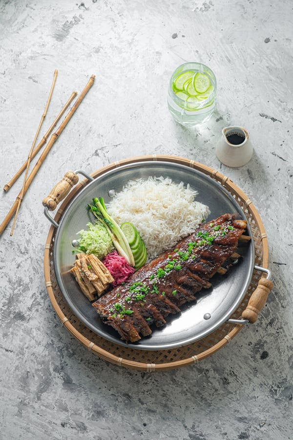 Asian Style Pork Short Ribs with Rice and Vegetables Stock Image ...