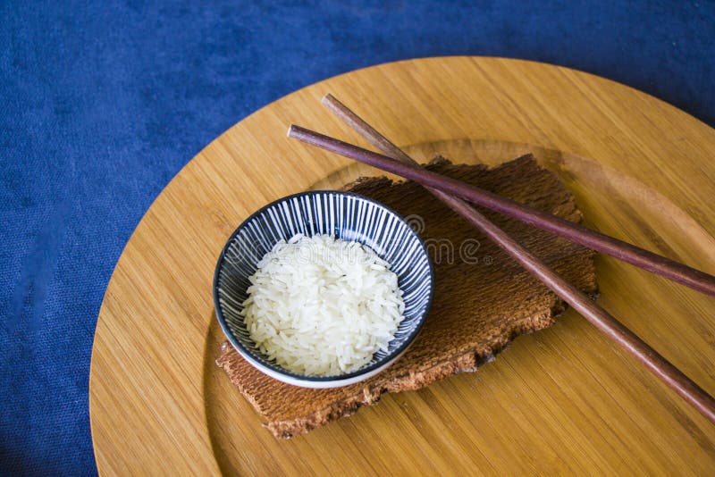 Asian Tableware, Raw Rice, Bowl and Chopsticks, Wooden Material ...