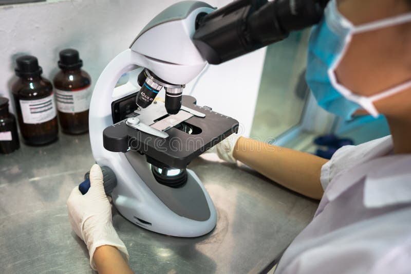 Asian Technician Tests the Quality of Product in Laboratory Closeup ... Asian Technician Tests the Quality of Product in Laboratory Closeup ...