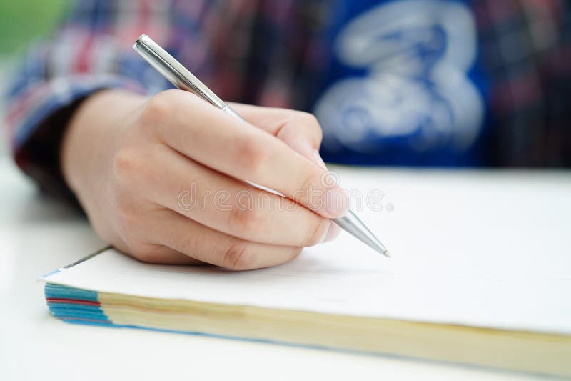 Asian Teenage Student Write Homework, Study Lesson for Exam Online ...