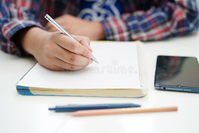 Asian Teenage Student Write Homework, Study Lesson for Exam Online ...